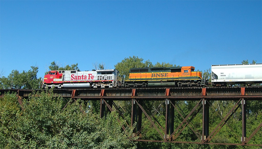 BNSF 651 leads BNSF 7334, ex CN EMD SD40, Westbound on the Missouri River Bridge
